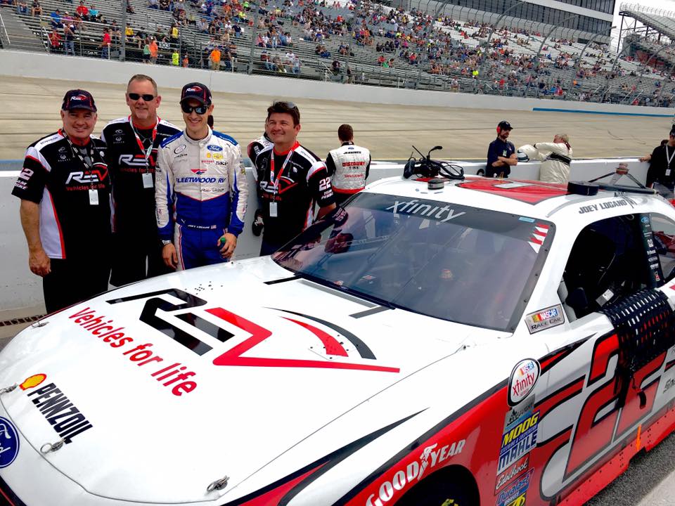 REV Group and Fleetwood RV Logos Displayed on Joey Logano's Race Car